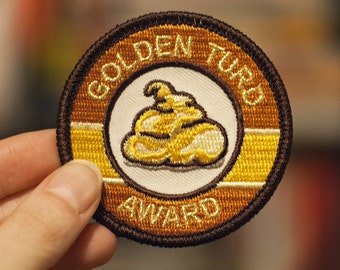 Golden turd | Etsy