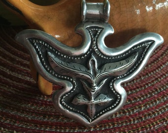 Repousse jewelry | Etsy