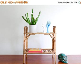 Wicker plant stand | Etsy