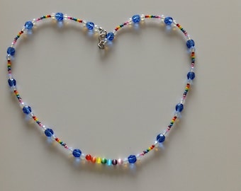 Items similar to Over the Rainbow -rainbow colored rosette PIN on Etsy