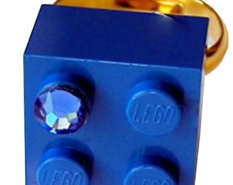 Yellow LEGO R brick 2x2 with a Diamond color SWAROVSKI