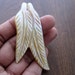 Intricate carved Wolf Buffalo bone carving Bovine by cabcabana