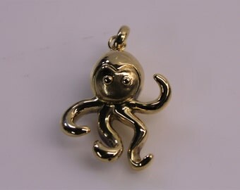 Gold octopus charm | Etsy