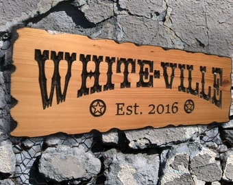 Deep carved personalized red cedar signs by CustomWoodSignShop