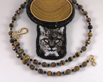 Specializing in high quality bead-weaving. by CreationsbyWhiteWolf