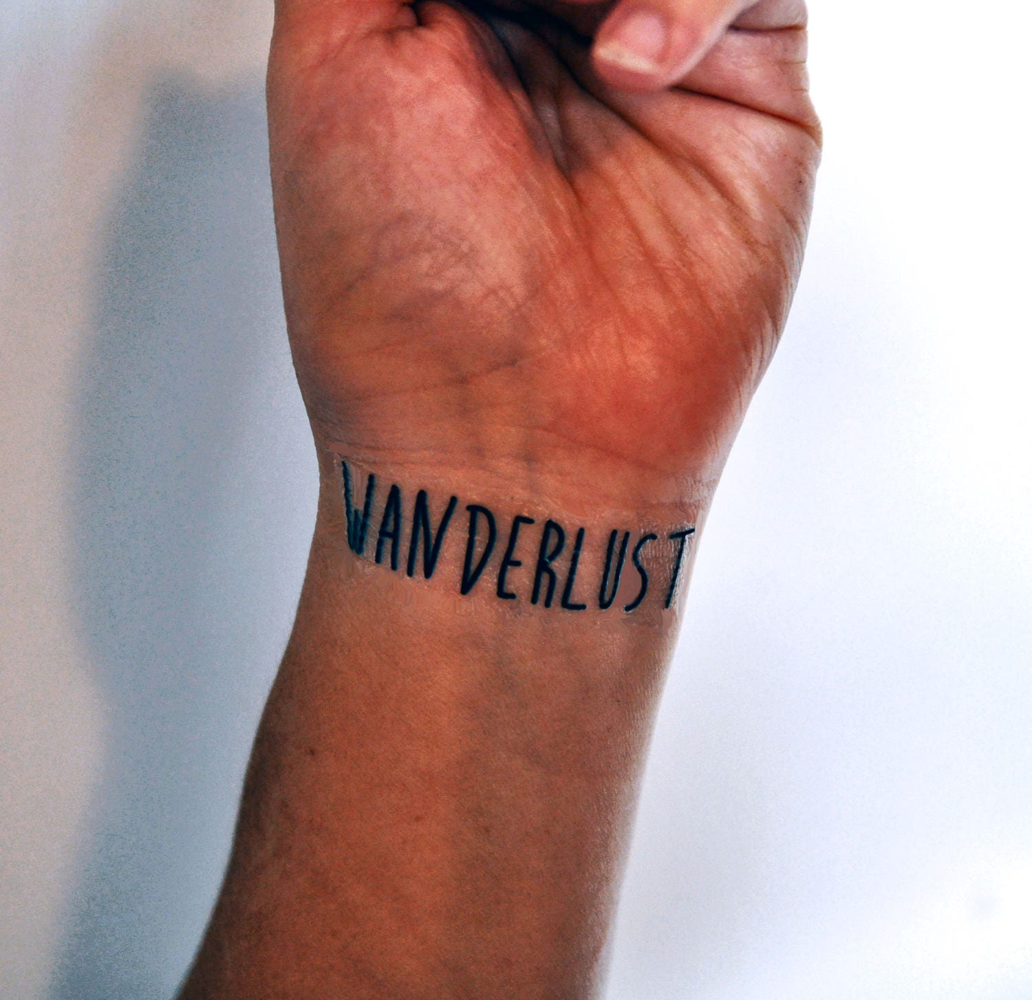 Wanderlust Arrow Tattoos