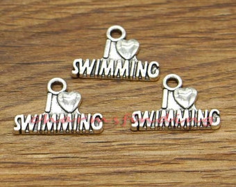 Swimmer charm | Etsy