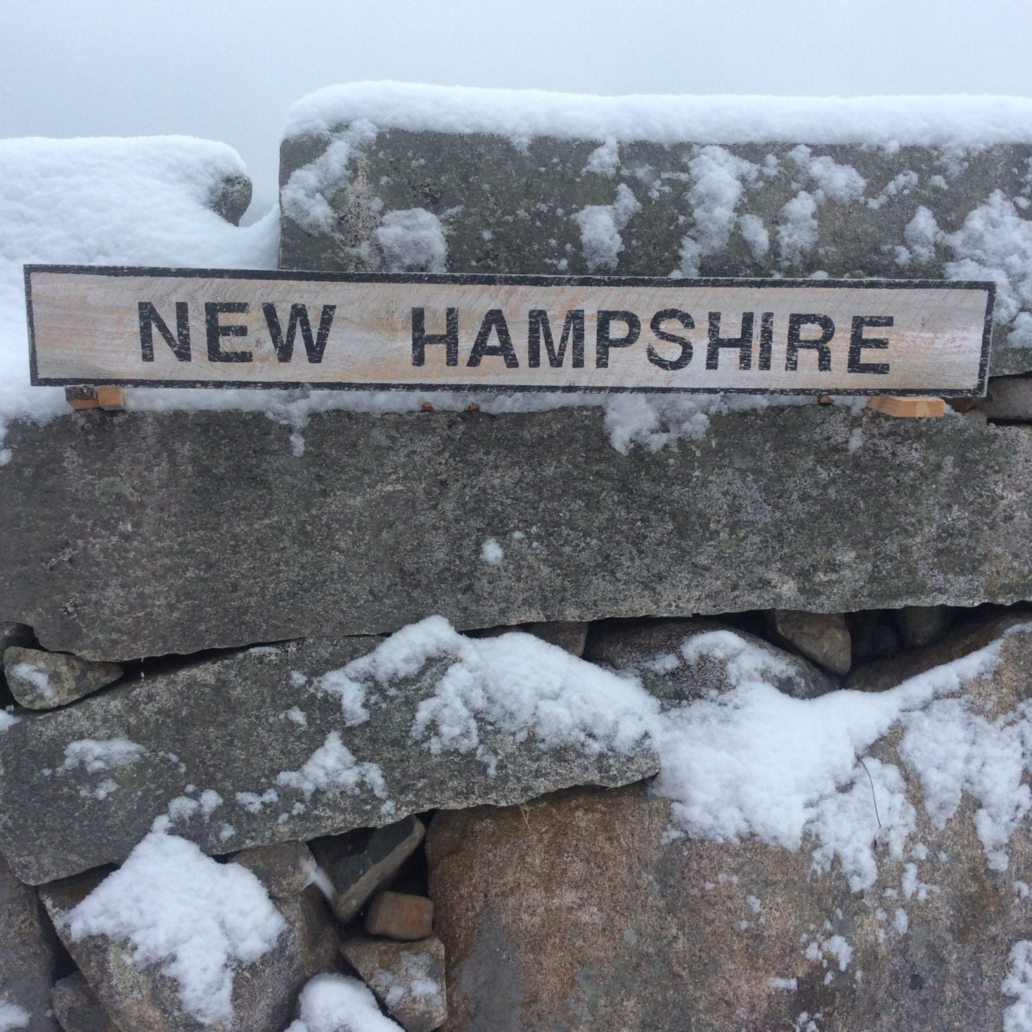 New Hampshire sign with rustic vintage appearance