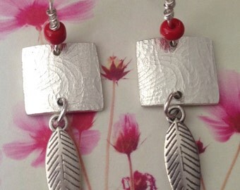 Feather earrings | Etsy