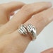 Hug Ring in Sterling Silver silver hug ring hugging hands