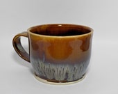 Handmade and handthrown ceramic stoneware mugs on Etsy by ZozPots