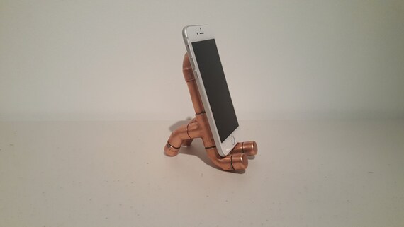 Copper pipe phone holder