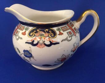 Flow blue pitcher | Etsy