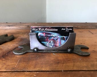 Hand crafted table lamp using repurposed engine/car parts.