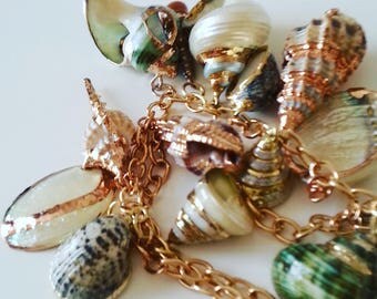 Gold shell necklace | Etsy