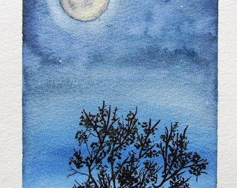 Items similar to Full moon in the night sky behind a tree surreal ...