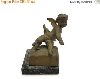 Cherub bookends | Etsy