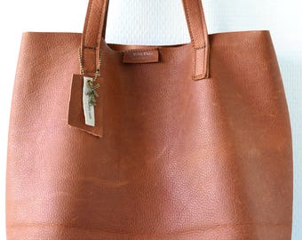Leather draw string bag hand stitched round sling bag Body