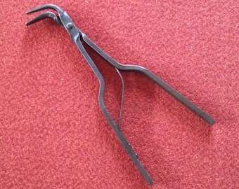 Cast iron tongs | Etsy