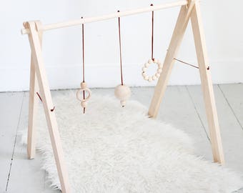 Wooden baby gym | Etsy