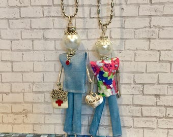 Hand-crafted doll pendants by ElliesBelles on Etsy