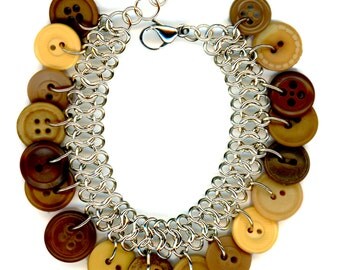 Items similar to Upcycled vintage buttons charm bracelet on Etsy