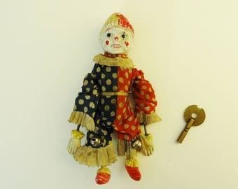 Wind up clowns | Etsy