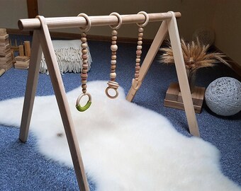 Wooden baby gym | Etsy