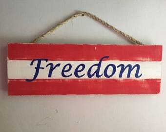 Defending Freedom Soldiers in Silhouette American Flag