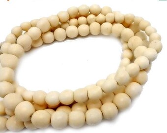 White buffalo beads | Etsy