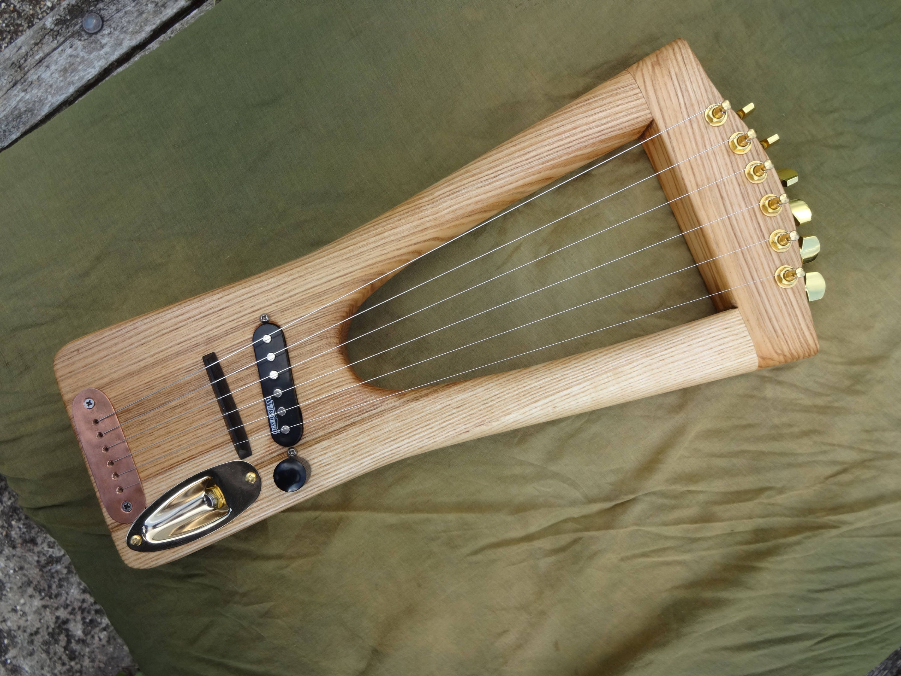 ukulele/saxon electric lyre unique instrument hand made from