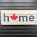 Canada HOME plaque sign with Canadian Maple Leaf