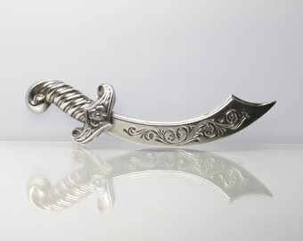 Scimitar brooch | Etsy