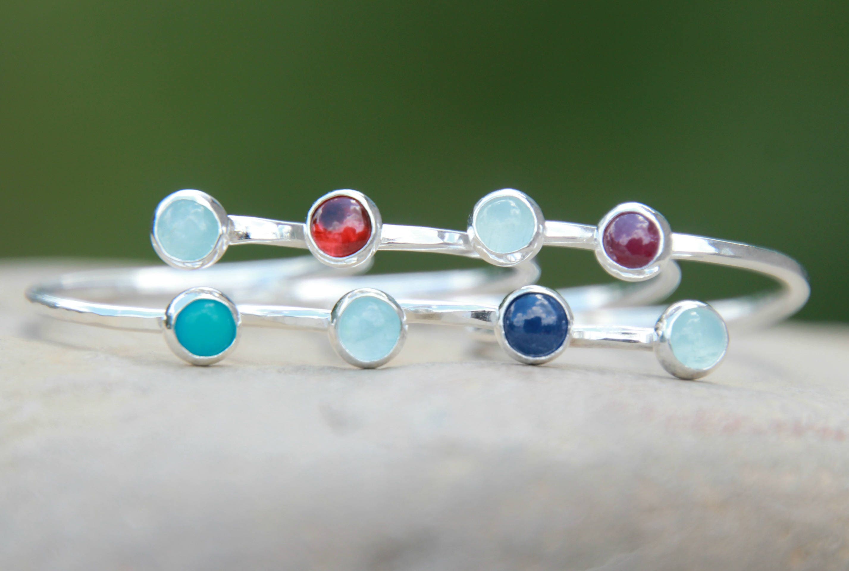 dual birthstone ring. two stone ring. gemstone couples ring.