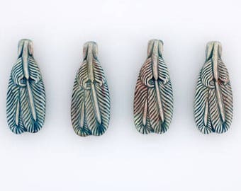 Ceramic feather | Etsy