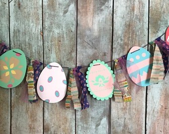 printable easter egg banner reads HAPPY EASTER cute colorful