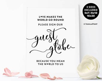 Love makes the world go round please sign our guest globe