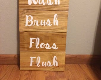 Please Wait To Be Seated Bathroom Sign