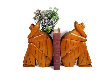 Carved wood bookends | Etsy