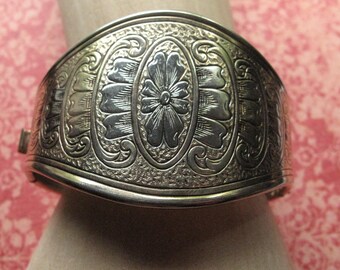 Embossed bracelet | Etsy