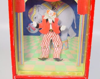 Wind up clowns | Etsy